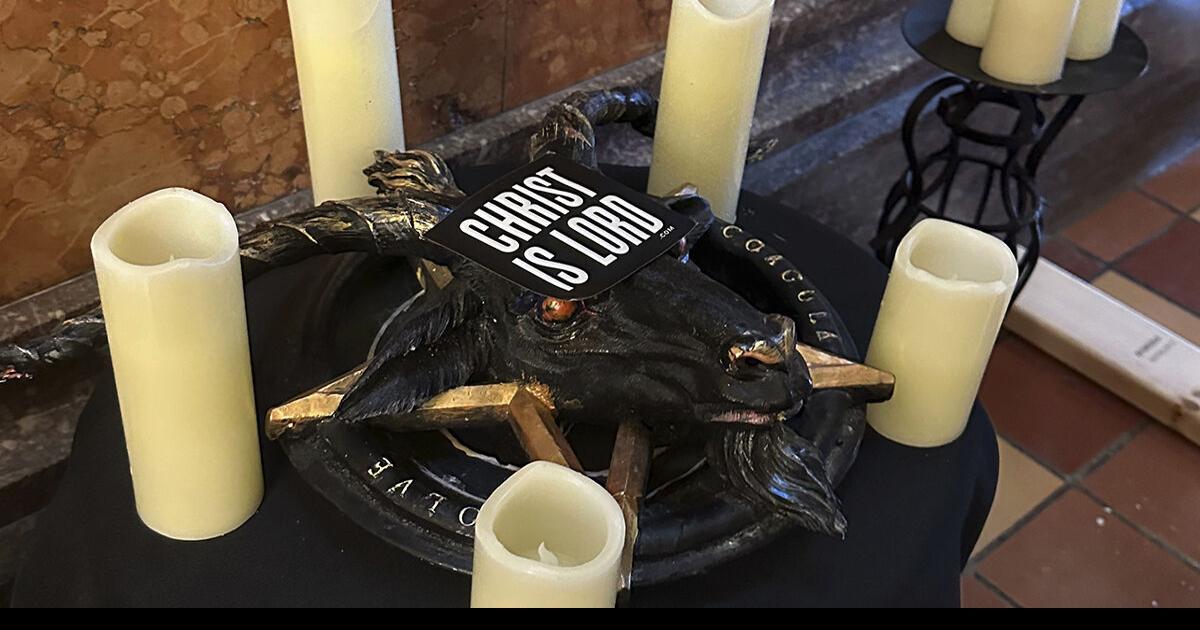 Candidate charged after a Satanic Temple display destroyed