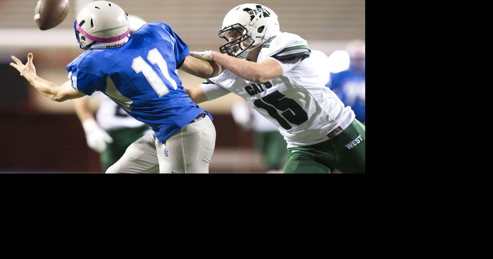 State football: Millard North holds on for title