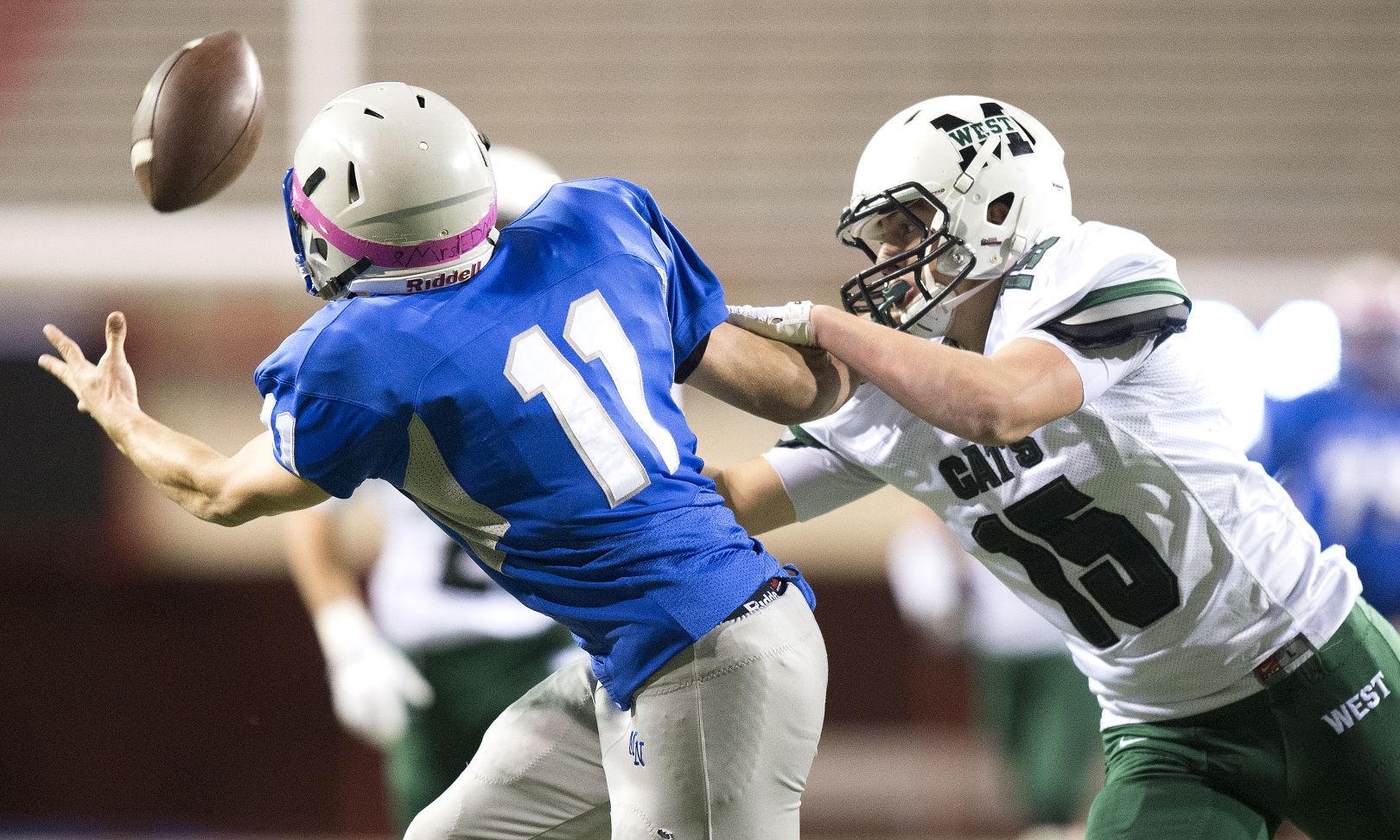 State football: Millard North holds on for title