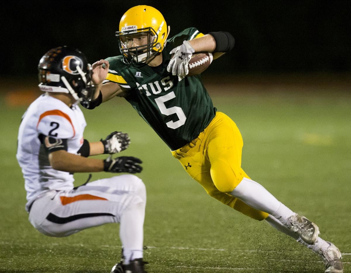 Prep football: Pius X wins first district title since 2004