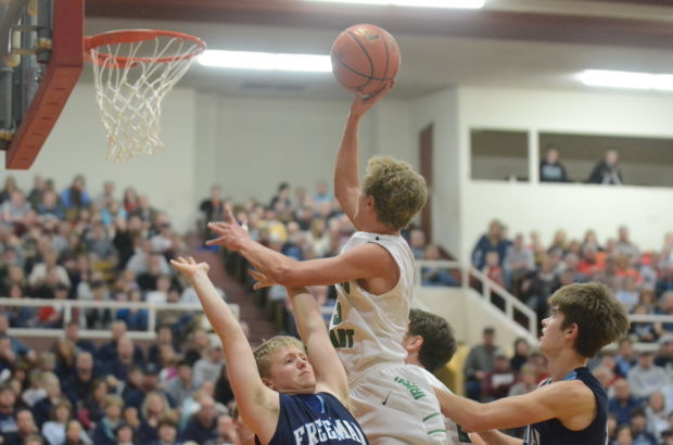 Prep boys basketball: Freeman wins MUDECAS title