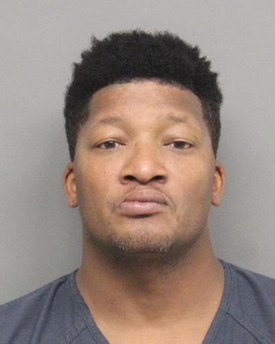 Search warrant turns up weapons, drugs; Lincoln man arrested