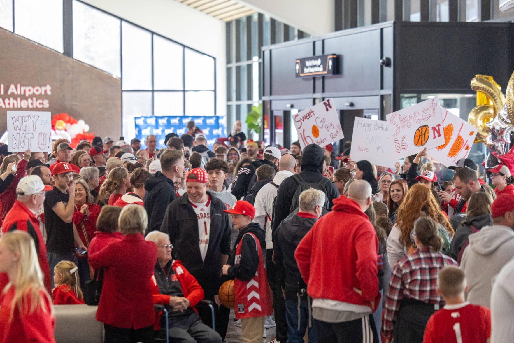 PHOTOS: Hundreds of fans welcome home their Husker heroes