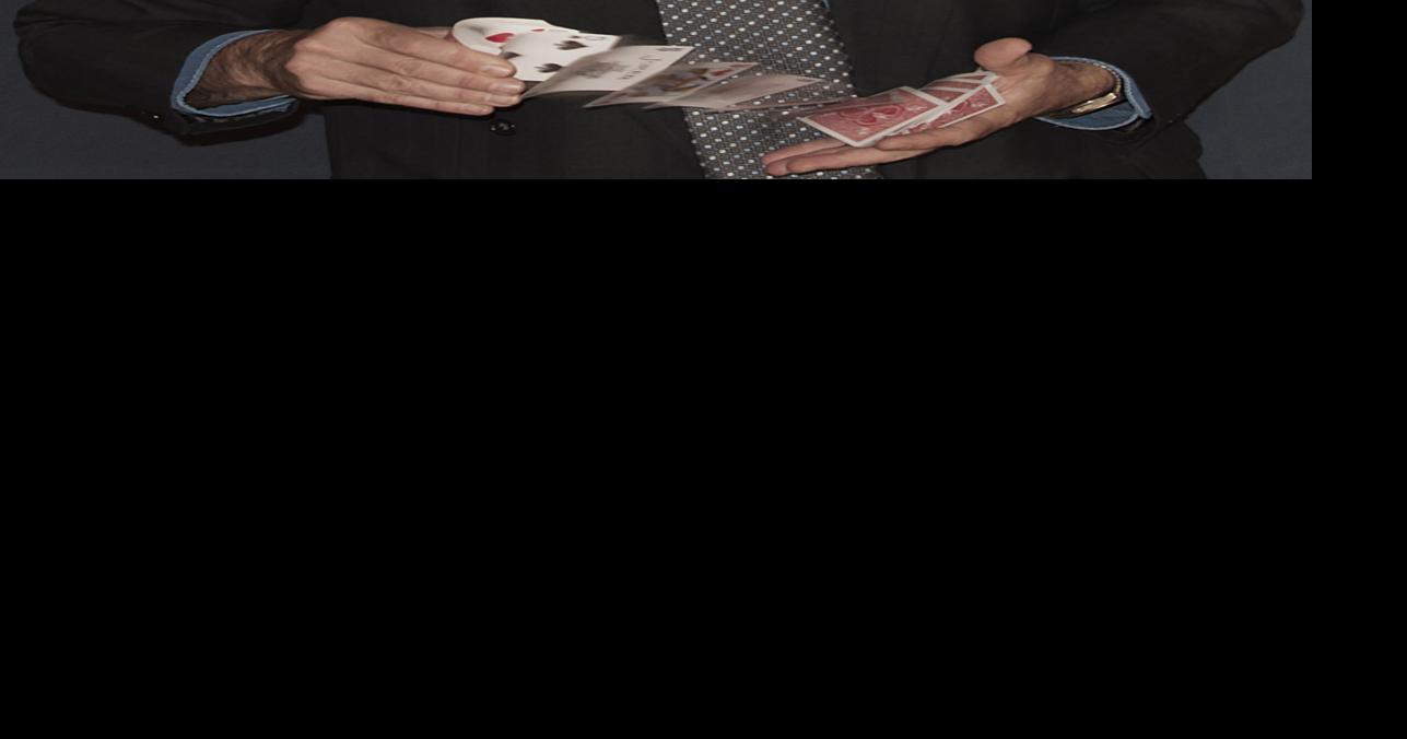 Comic magician Gayle Becwar performing at Comedy Loft