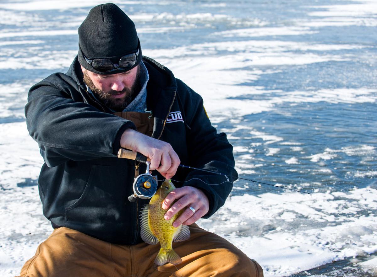 Despite winter weather, good turnout at ice fishing clinic | Local ...