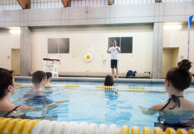 NWU students learning music conducting in the pool
