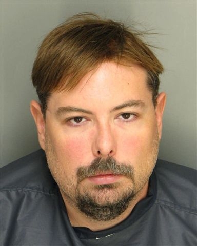 Nebraska state employee accused of assaulting foster son