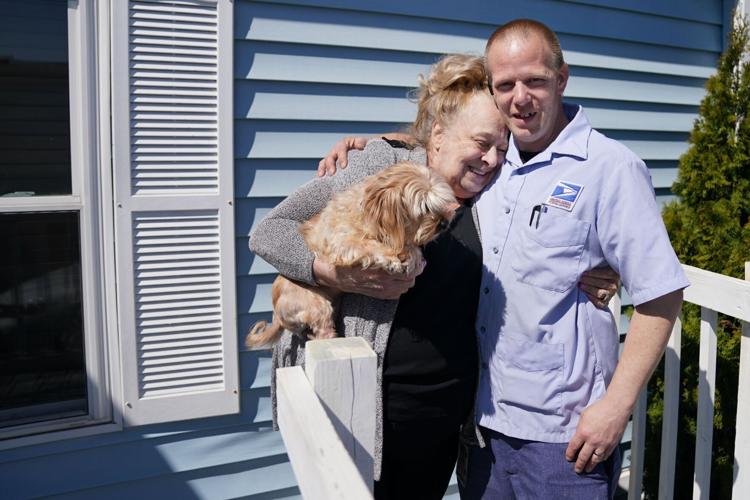 New York letter carrier honored for saving life during fire