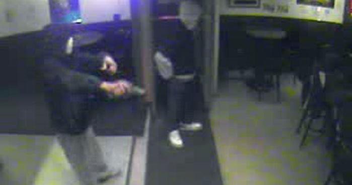 Surveillance footage released from bar homicide, armed robbery