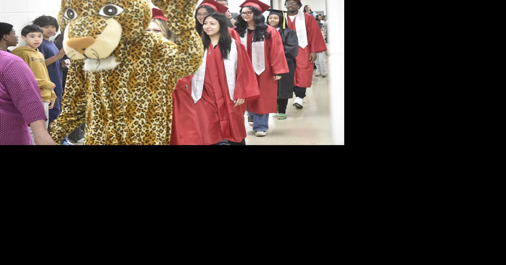 Six photos of HS seniors returning to Jerstad-Agerholm school