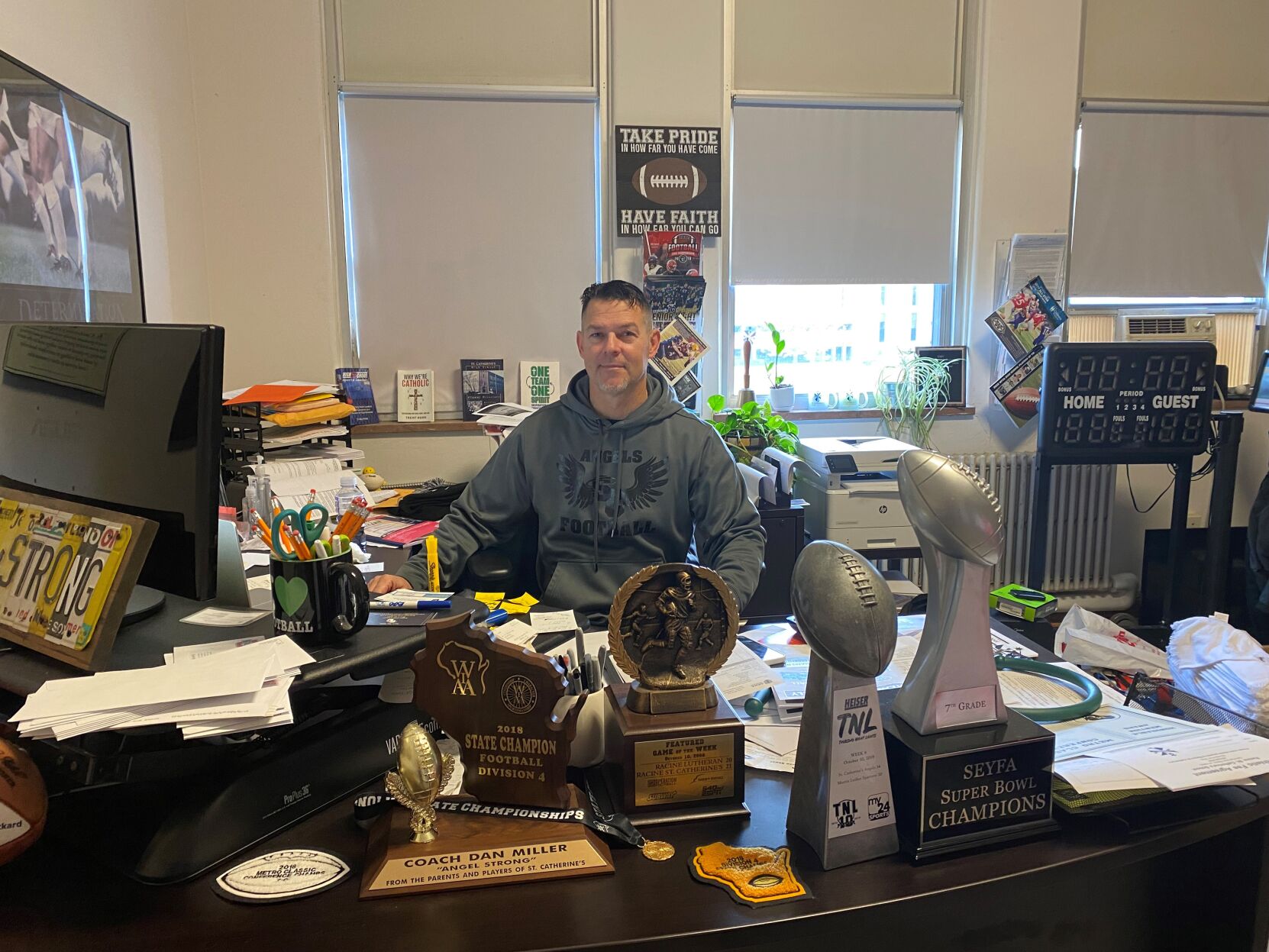 Dan Miller is 166-63 as St. Catherine's football coach