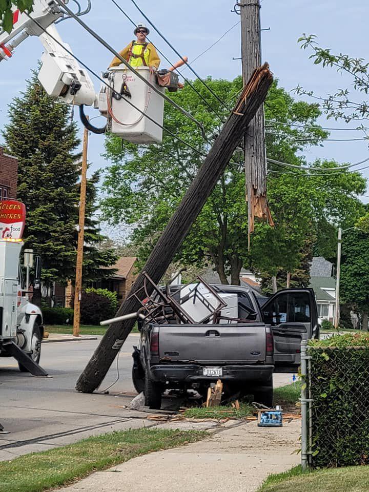 Photos of Monday pickup truck crash that left utility pole snapped in half