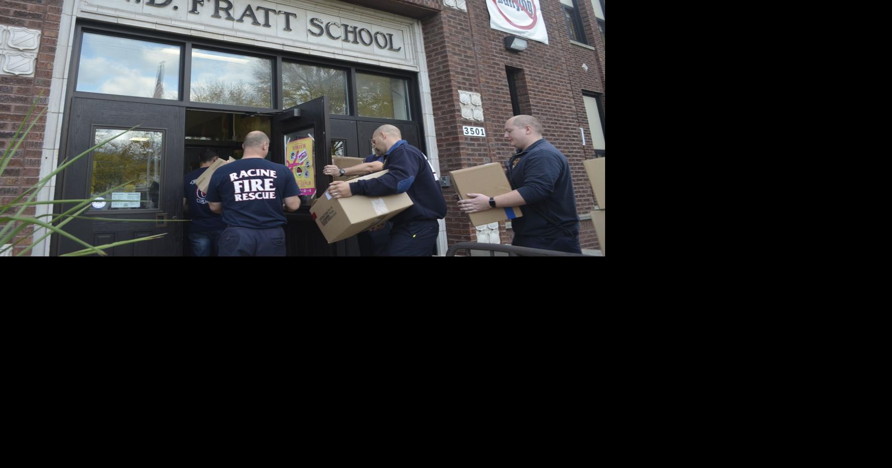 In Photos: Racine firefighters deliver coats to Fratt Elementary
