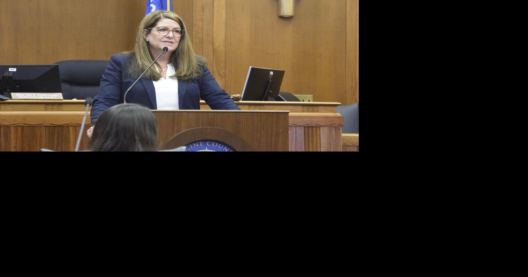 Judge Kristin Cafferty at stand