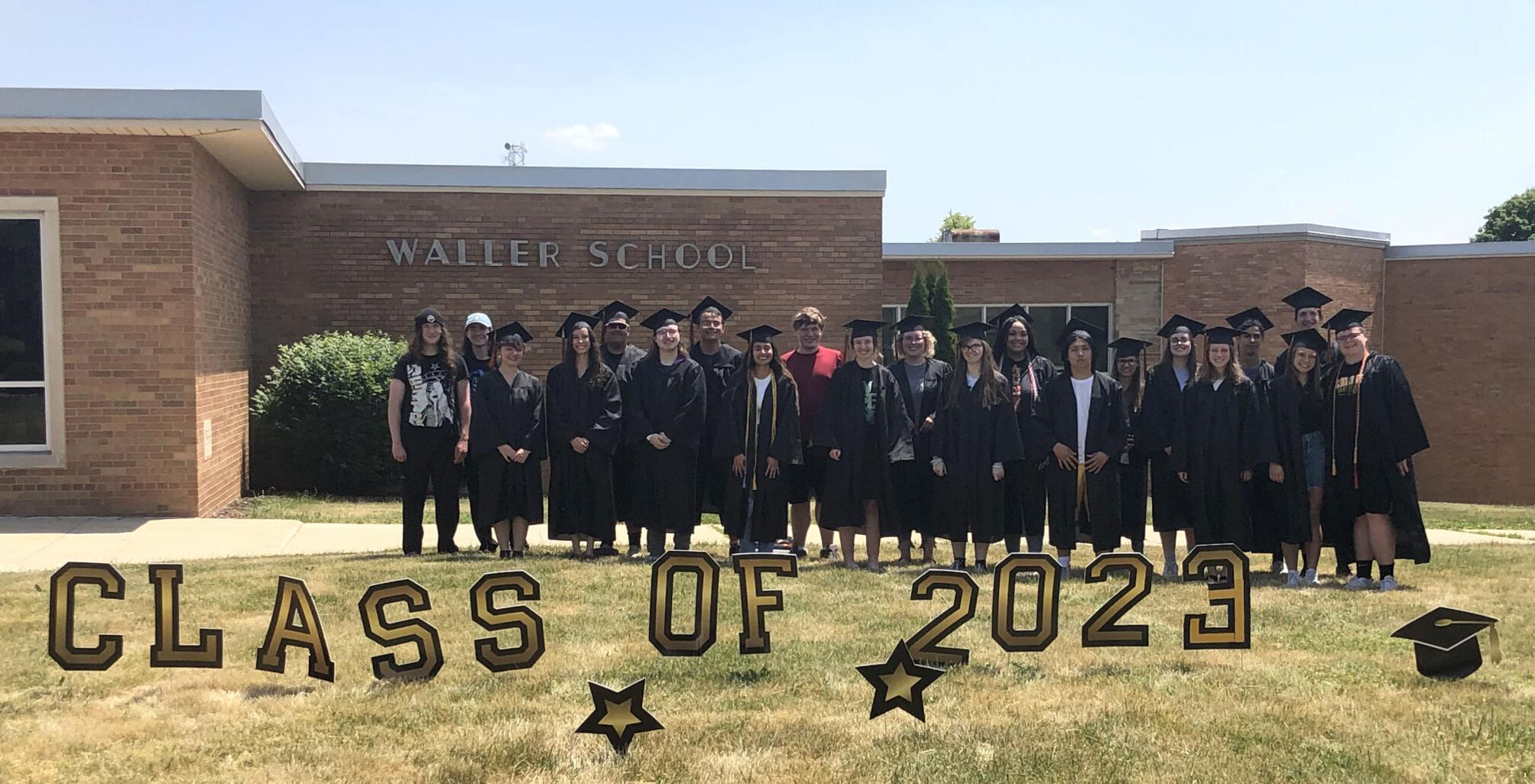 Twelve photos of Burlington HS seniors returning to Waller Elementary