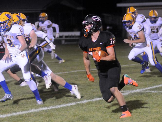 High school football: Burlington dominates in opener