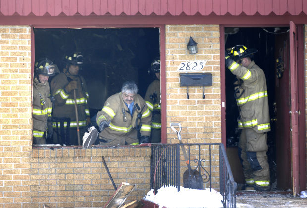 Woman dies after being pulled from fire on Webster