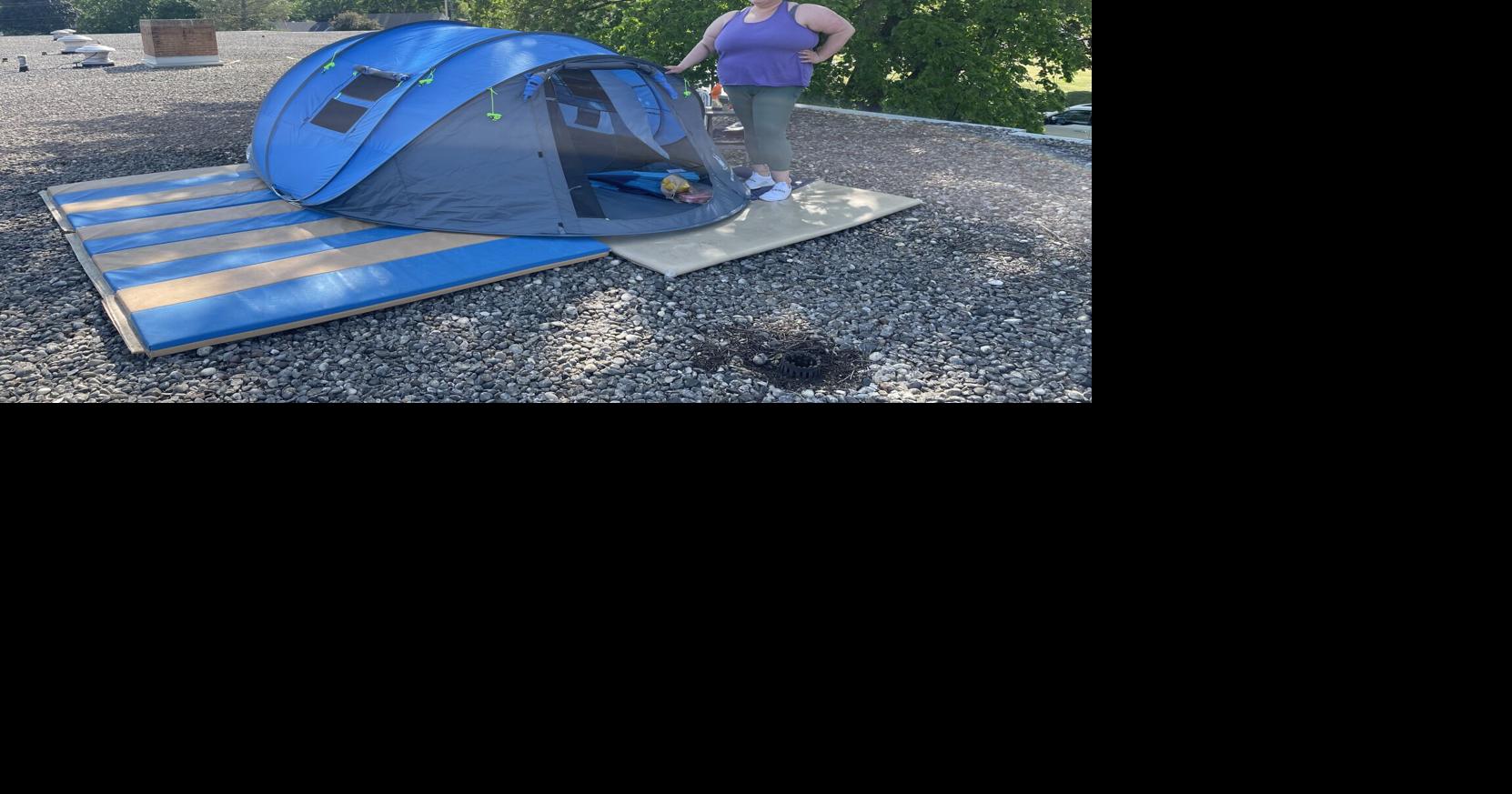 Waller principal takes to roof after fundraiser goal met