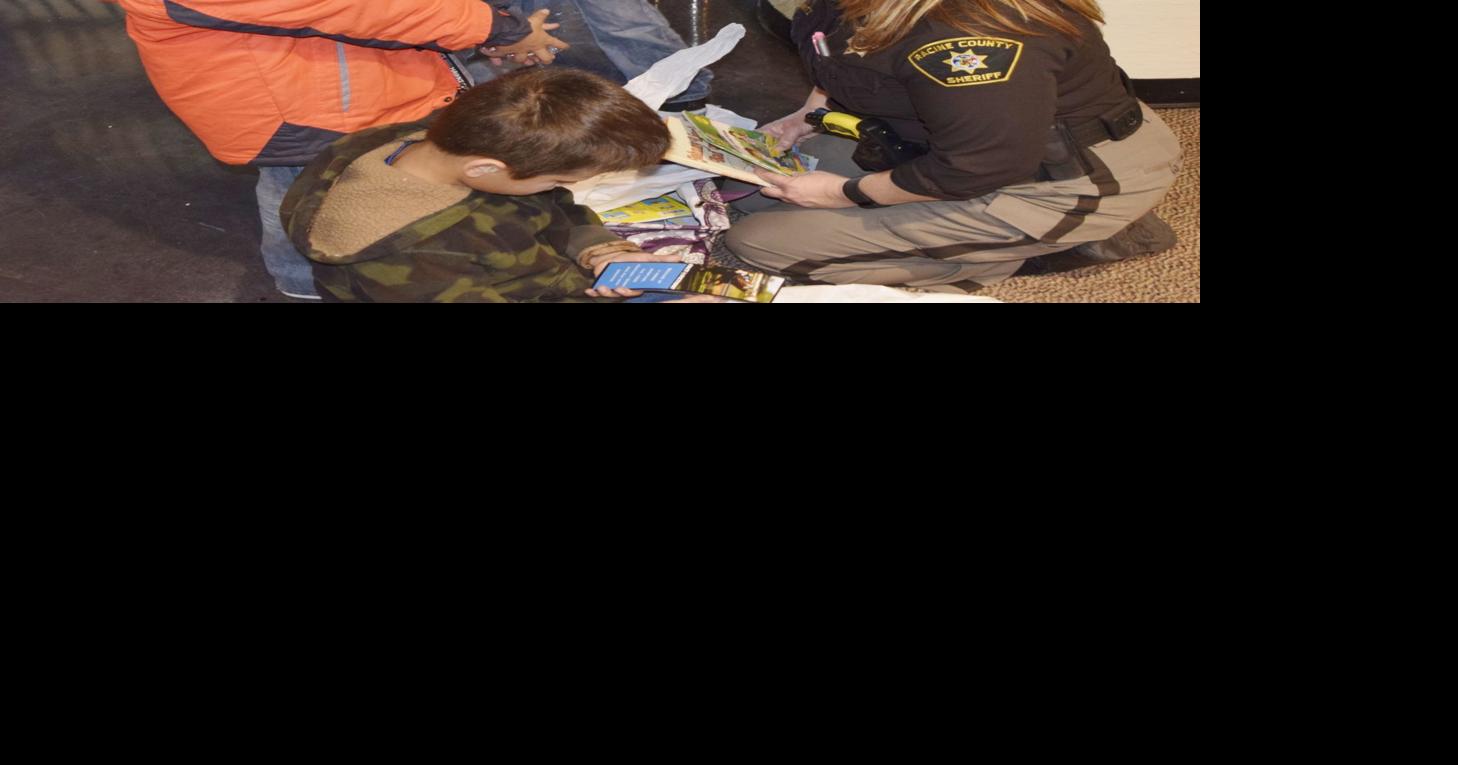 Thousands attend Cops 'N Kids Book Giveaway