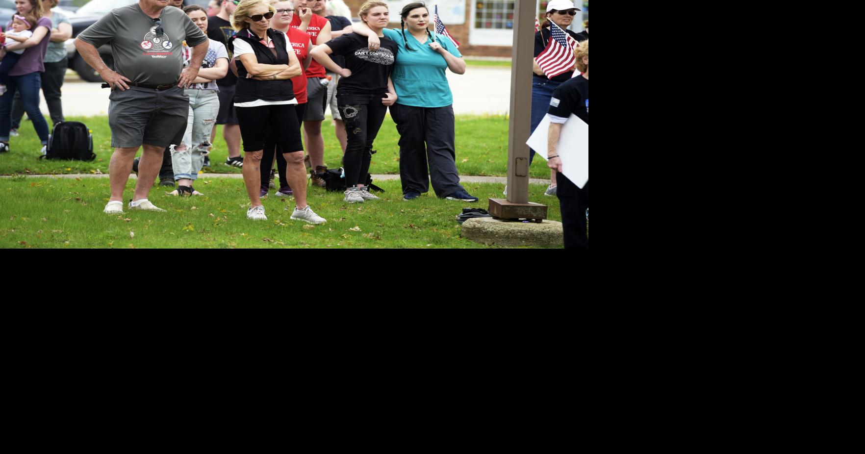 Watch here: More than 100 people rally to ReOpen Burlington