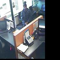 PHOTOS: Surveillance footage of Check 'n Go robbery