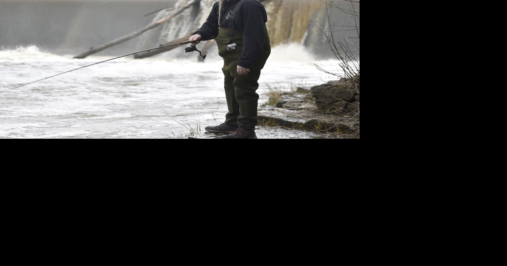 Anglers fish for steelhead on Root River