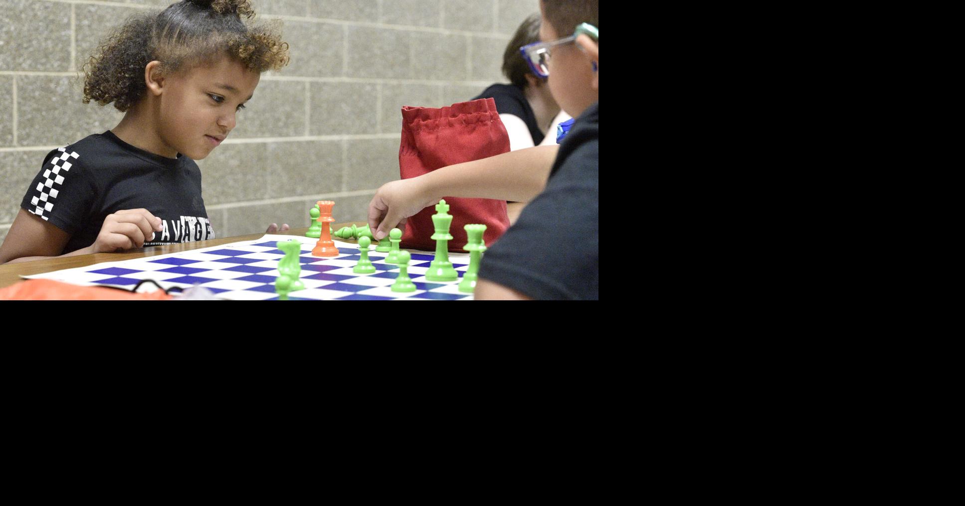Six photos of chess taught by Ed Larkin