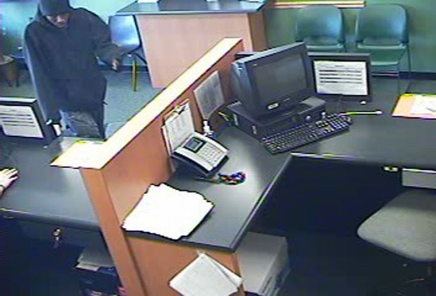 PHOTOS: Surveillance footage of Check 'n Go robbery