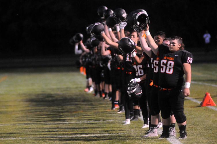 High school football: Burlington dominates in opener