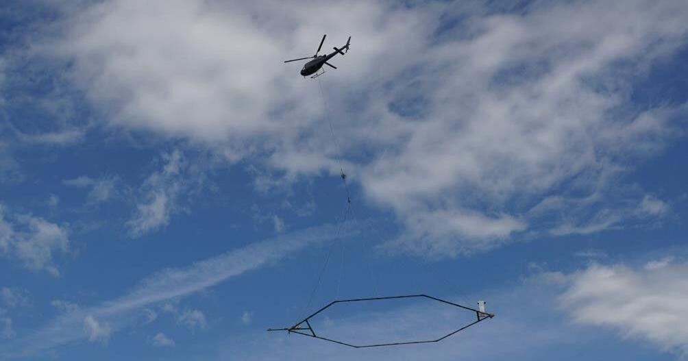 See a helicopter flying low overhead with a big hoop under it? Here's ...