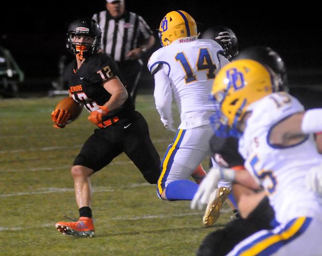 High school football: Burlington dominates in opener