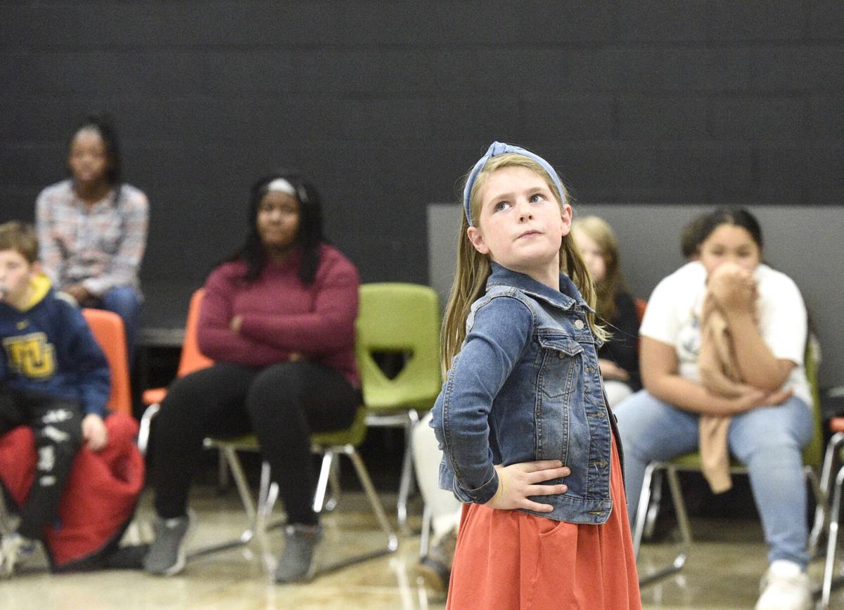 Seven photos of Gilmore Fine Arts students rehearsing "Matilda, Jr."
