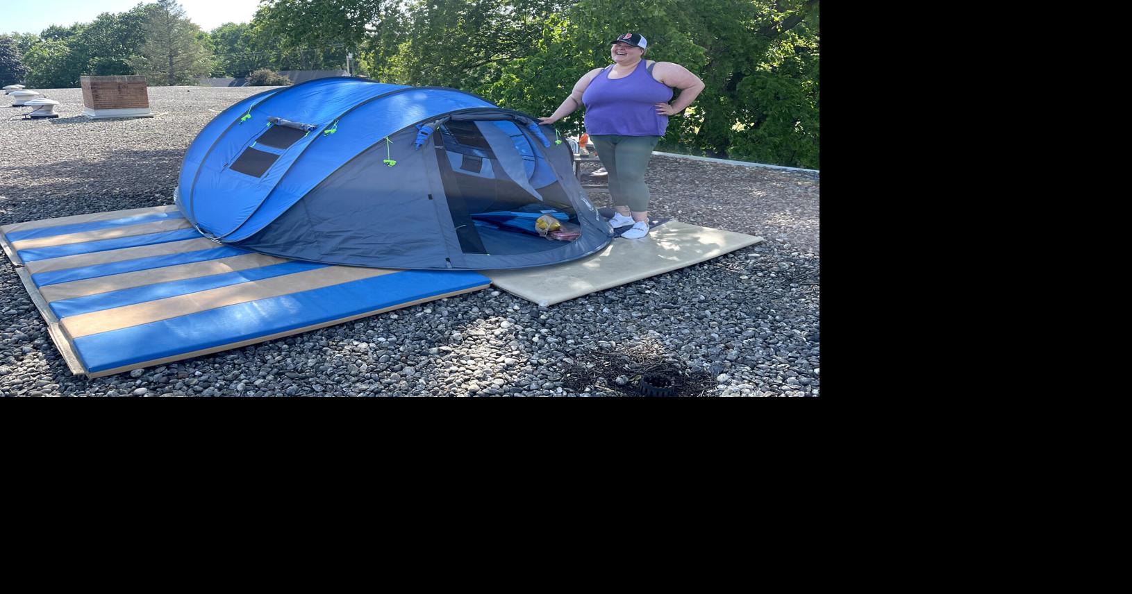 Burlington principal camps on roof after students exceed fundraising goal