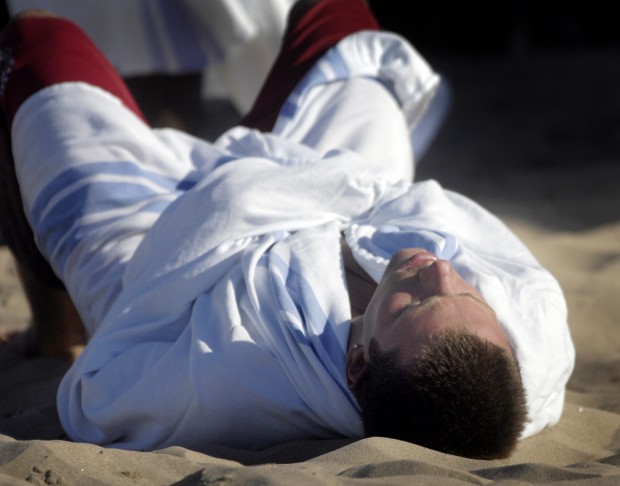 Lifeguards injured rescuing boys from no-swimming area