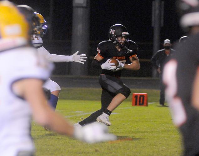 High school football: Burlington dominates in opener