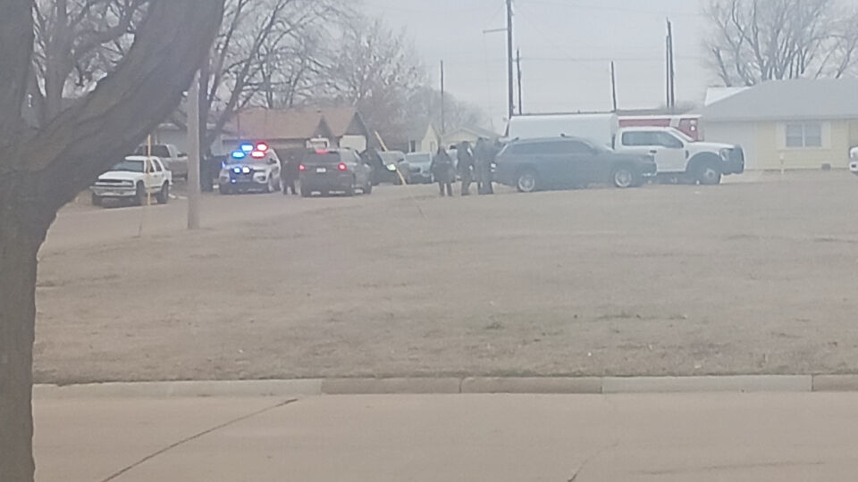 KBI identifies Salina man who threatened police while holding toddler ...