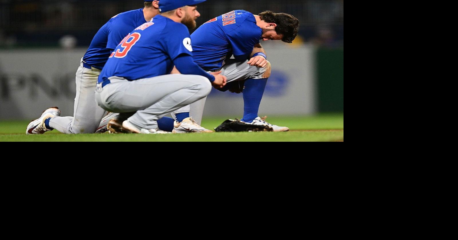 Fan hospitalized after scary fall from outfield wall during Cubs and ...