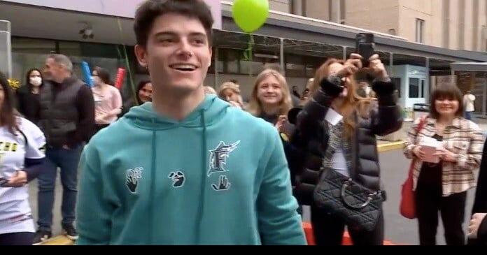 High school quarterback met with huge celebration after final chemo ...