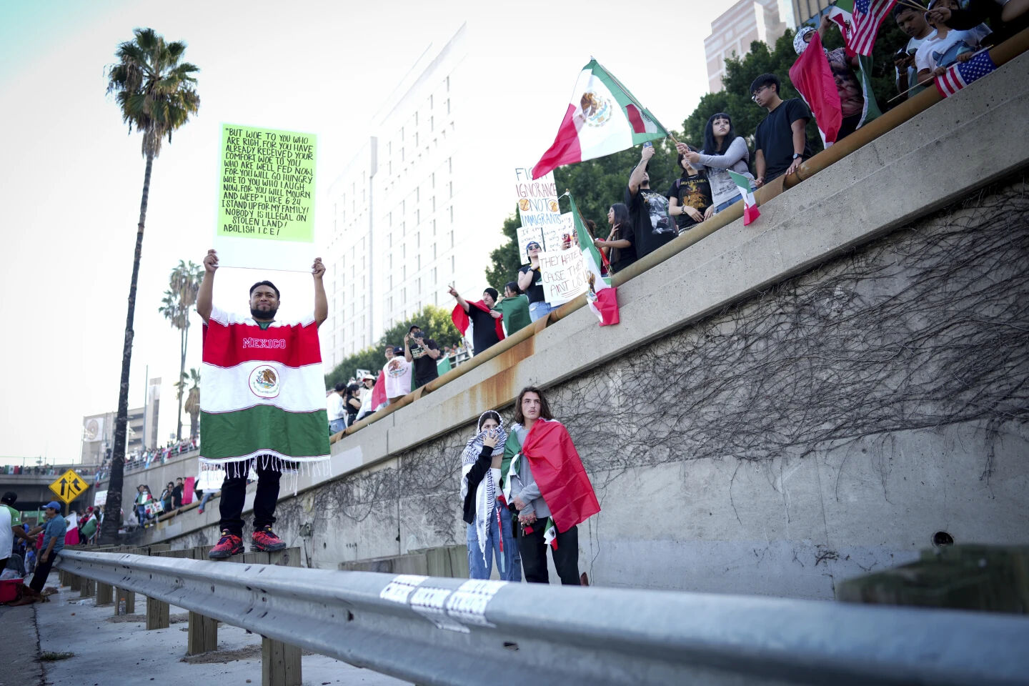Marchers protesting planned deportations block major freeway in Los ...