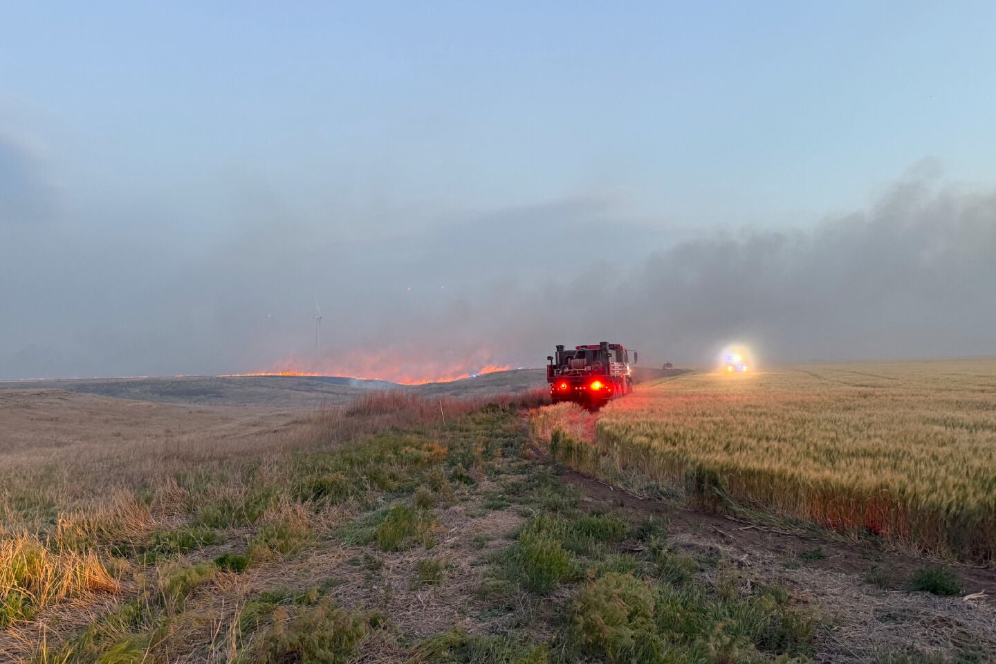 Kansas fire crews begin journey home after intense wildfire battle ...