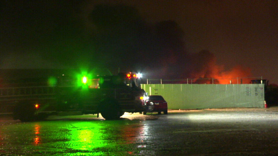 Crews battle early morning salvage yard fire; 200 cars damaged or ...