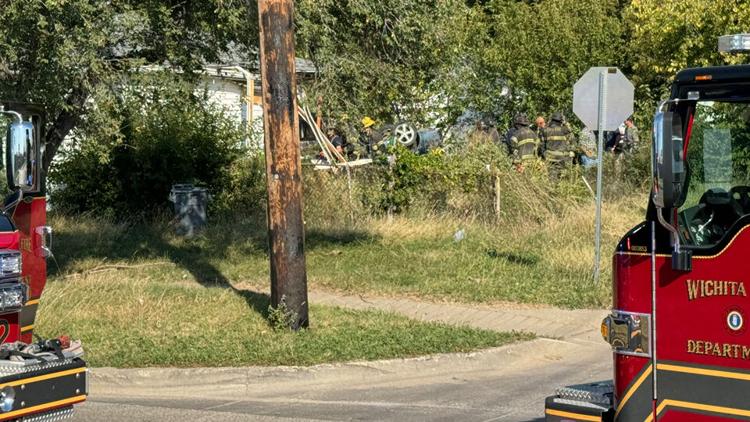 Video shows speeding car lose control before crashing into Wichita home ...