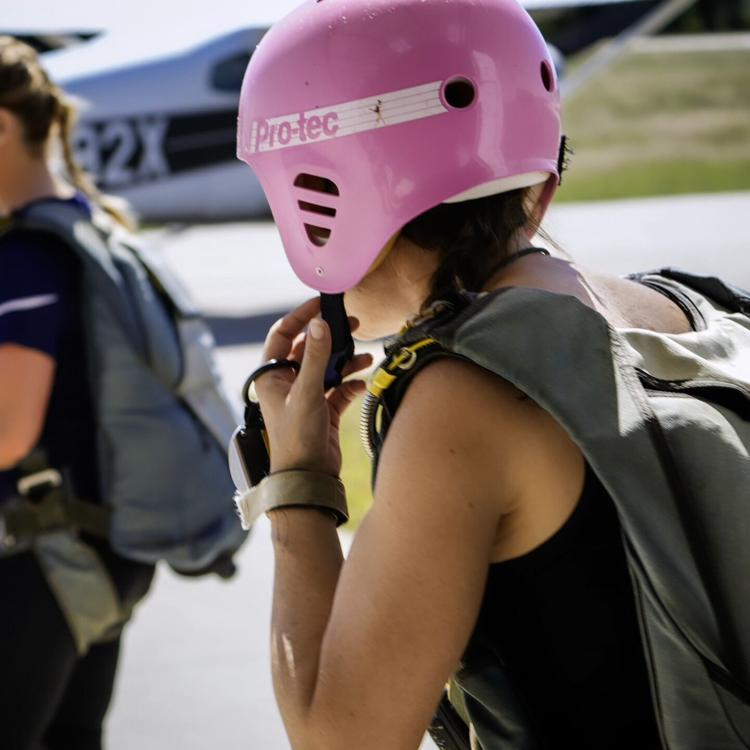 Woman dies after backing into active propeller while taking photos at ...