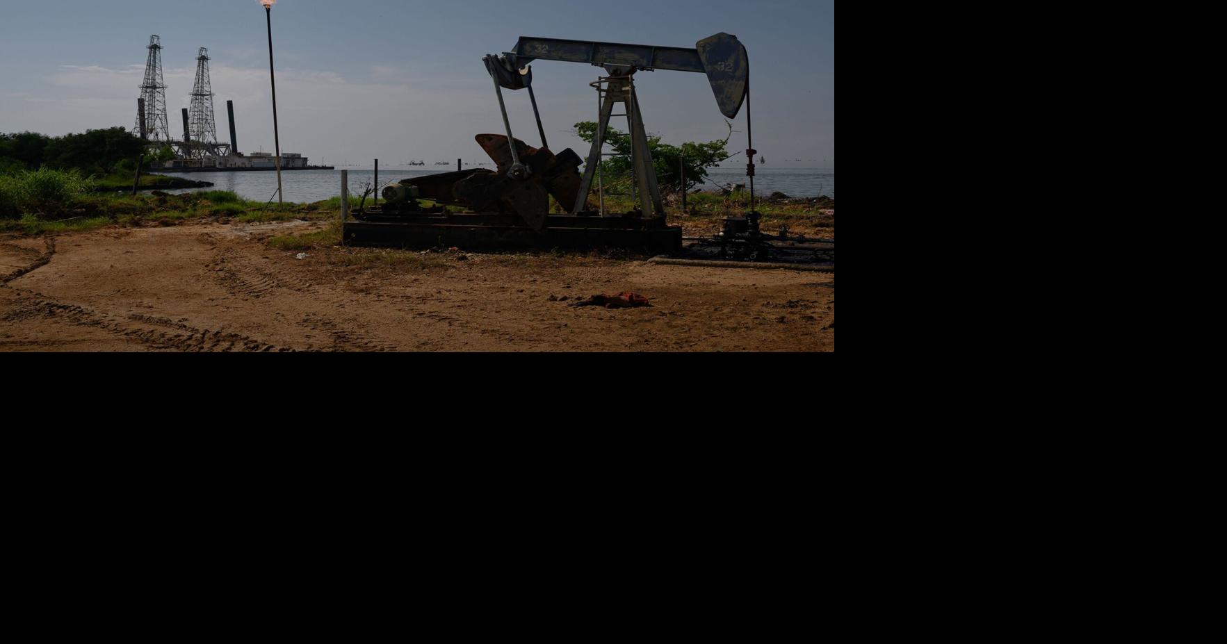 Venezuela approves new law opening its oil industry as Trump threatens ...