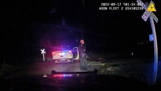 Colorado police release video of police car with suspect inside hit by ...