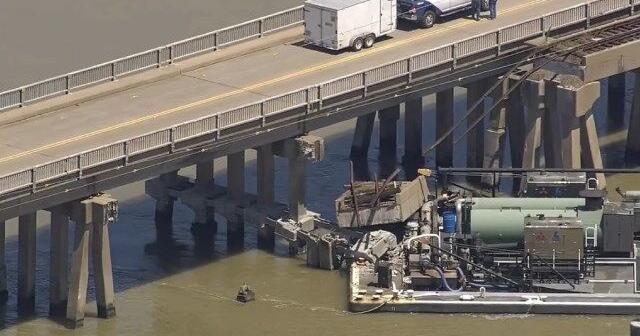 Barge hits a bridge in Texas, damaging the structure and causing an oil ...