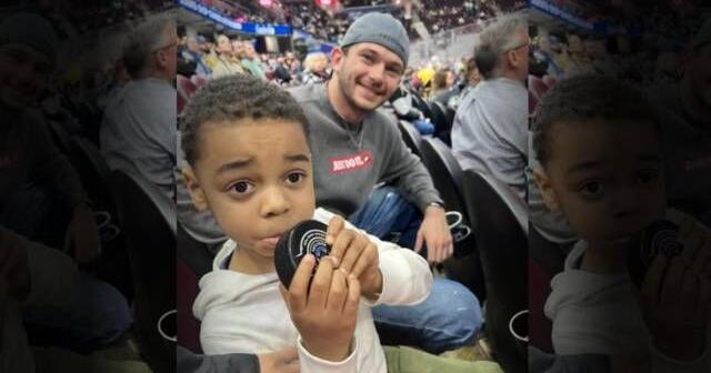 Hero hockey fan blocks out-of-play puck from hitting 4-year-old boy ...