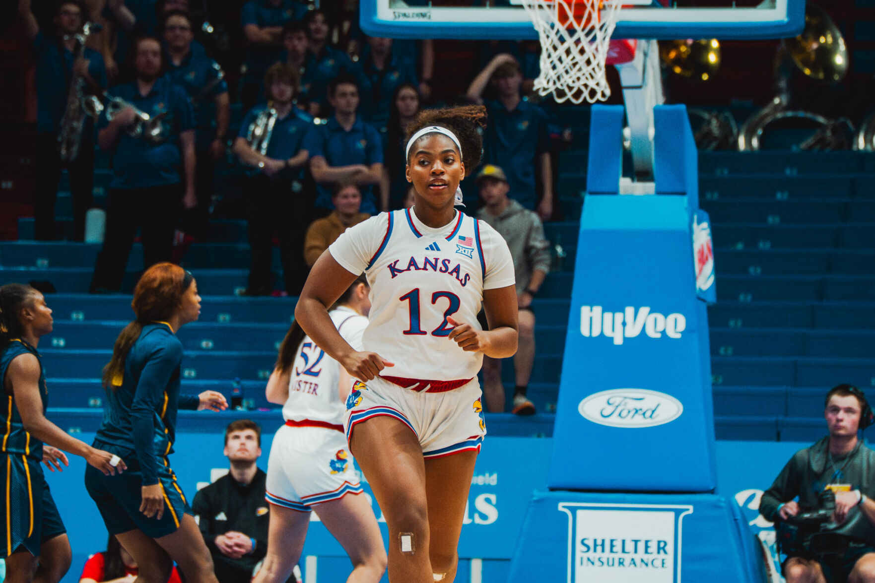 Kansas women's basketball pushes past slow start to win season opener ...