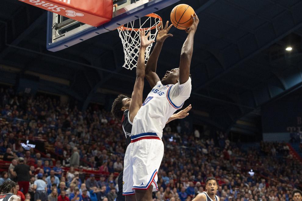 Flory Bidunga rocks the rim in his Kansas debut against Howard | Sports ...