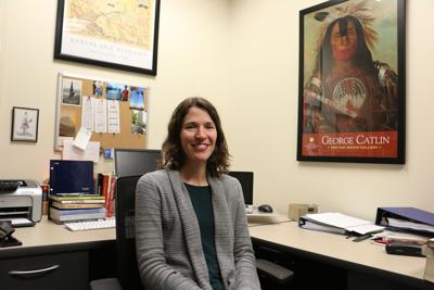 English professor recognized by University, receives Shutz award for ...